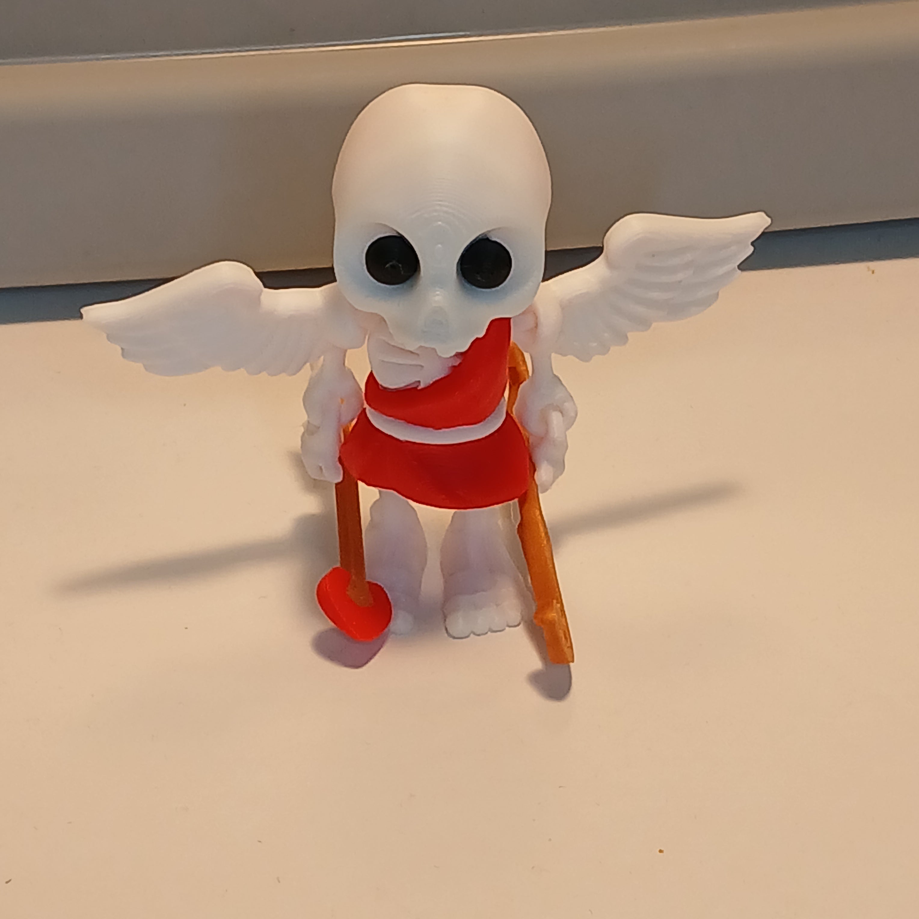 3D Printed Articulated Skeleton Cupid with Bow and Heart-Shaped Arrow ...